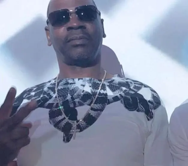 Detroit Man Makes it Rain Cash at His Own Funeral